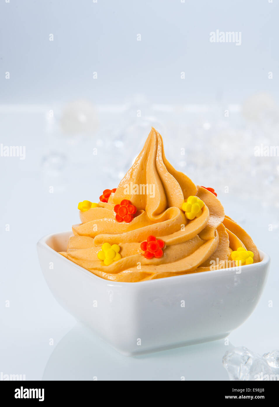 Close up Delicious Yellow Colored Frozen Yogurt on White Bowl Served on ...