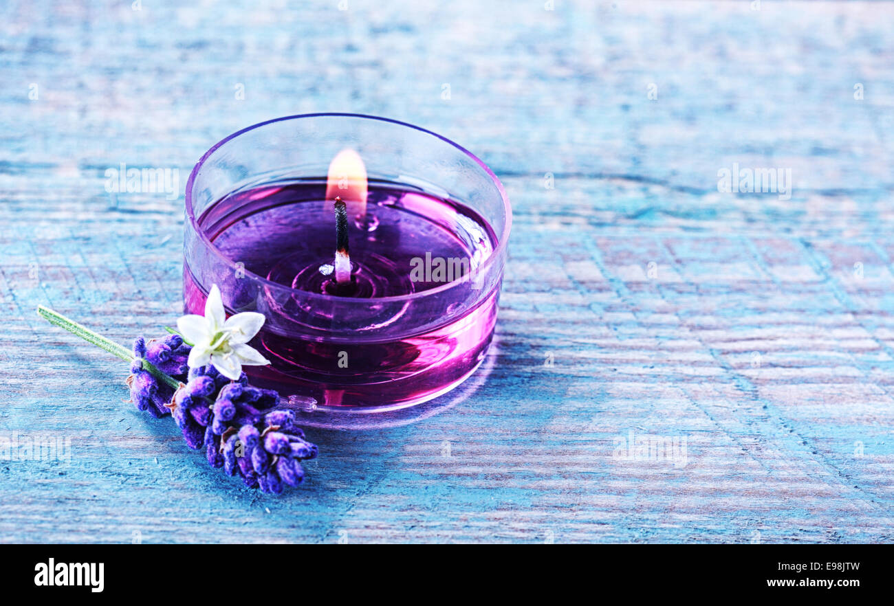 Aromatherapy spa background with a sprig of fragrant lavender alongside ...