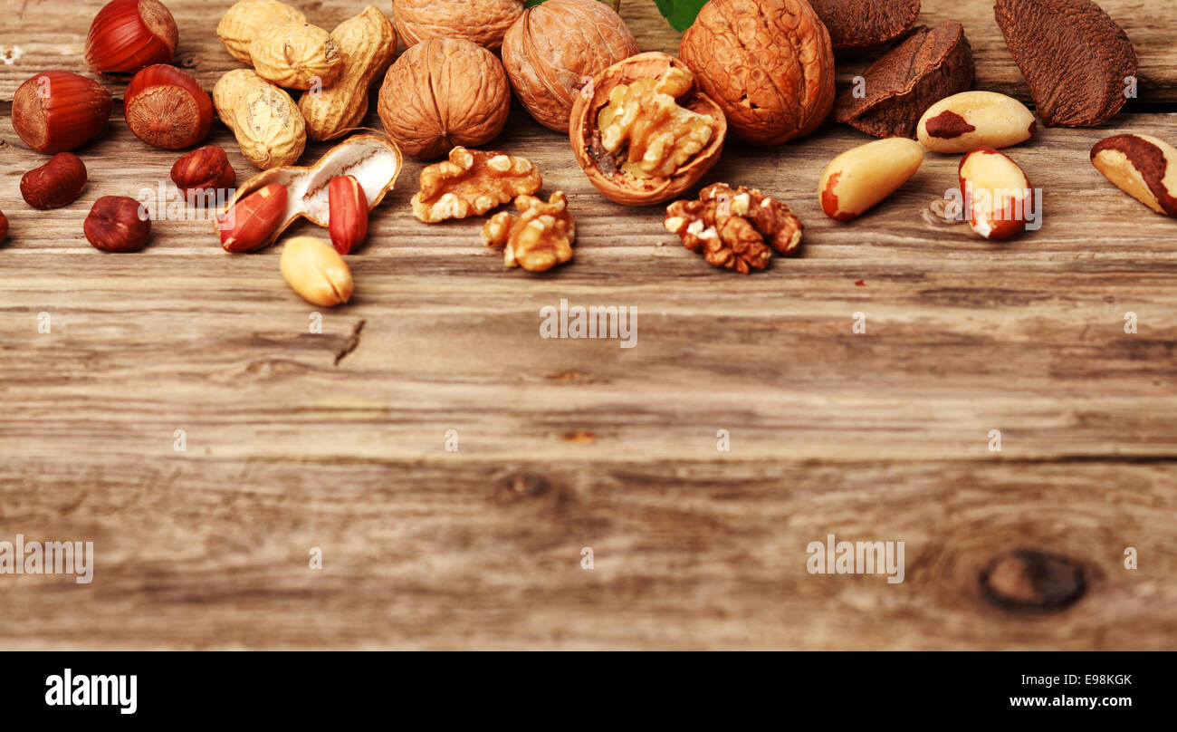 Selection of festive fresh nuts both shelled and in their shells on ...