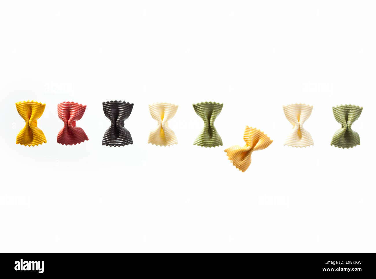 A row of noodles with different colors isolated on white background ...