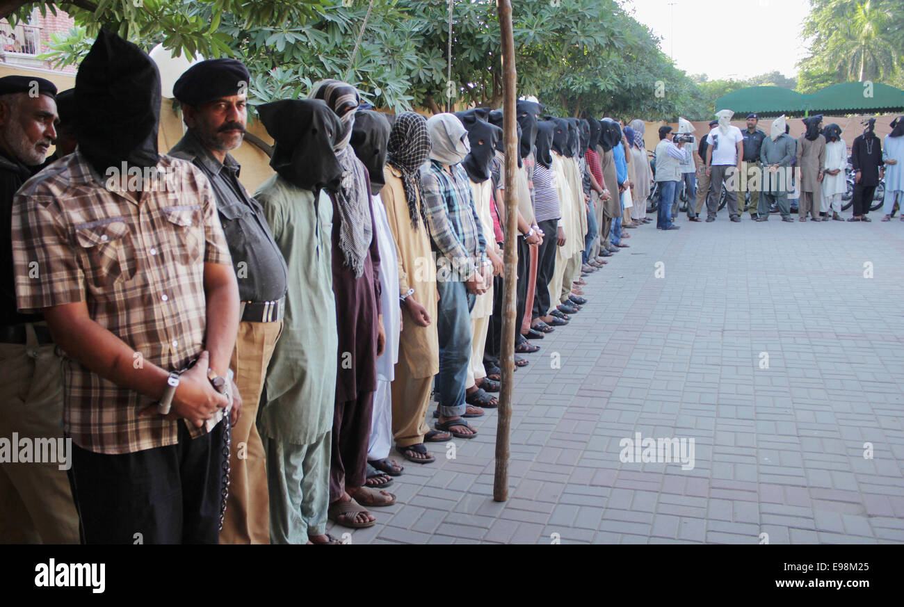 Lahore, Pakistan. 21st Oct, 2014. Pakistani CIA Police Lahore officials ...