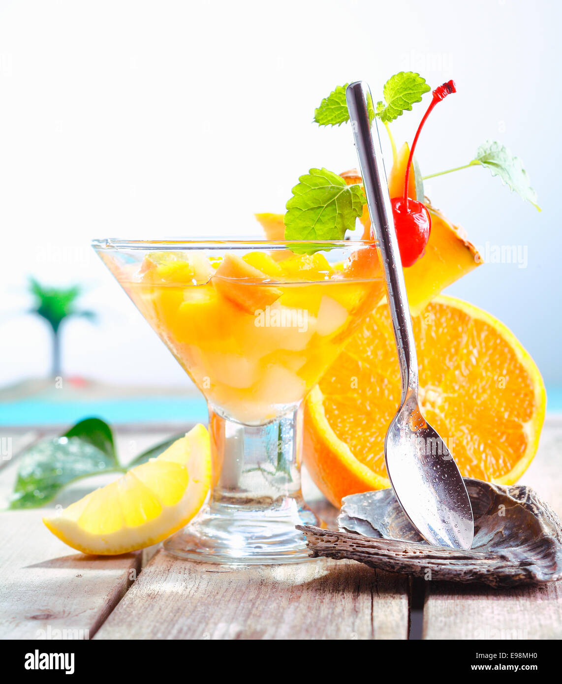 Colourful exotic fruit cocktail of fresh tropical fruits presented with ...