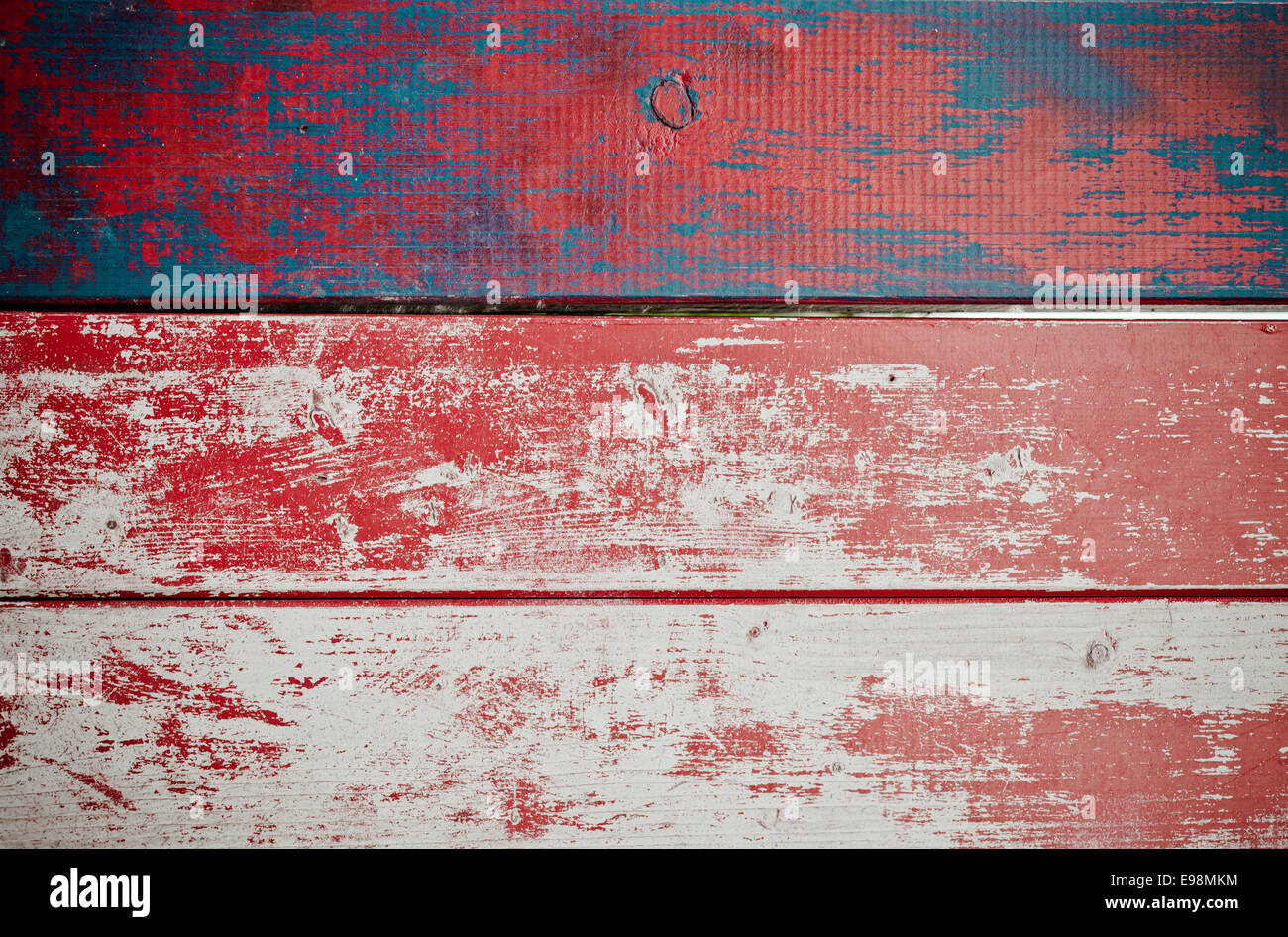 Grunge painted wooden texture background with red paint peeling off ...