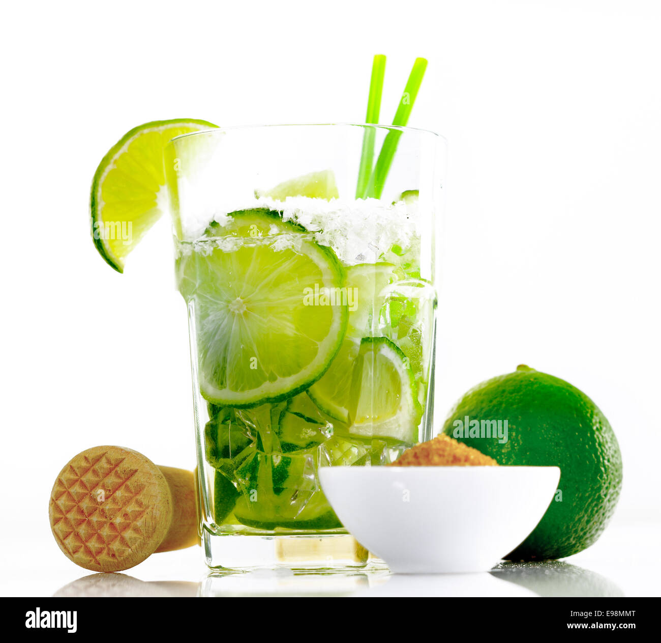 Caipirinha isolated on white background, with a mortar and brown sugar ...