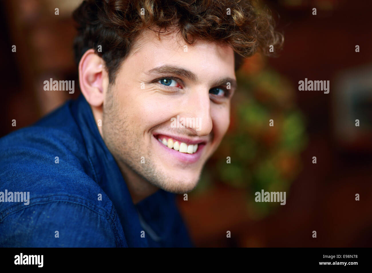 Closeup portrait of a happy man looking at camera Stock Photo - Alamy