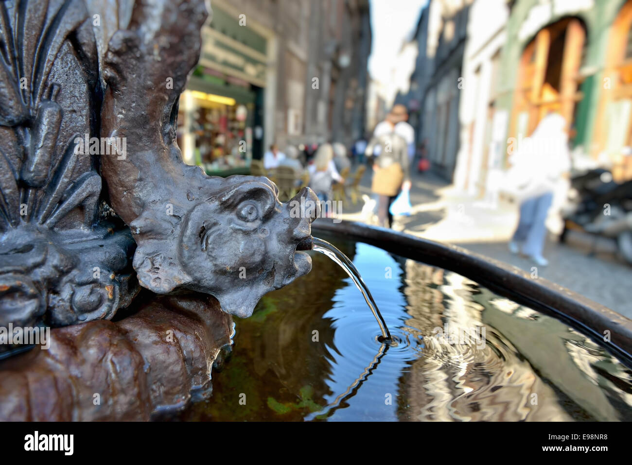 Old fountain in popular quarter in historical center of Liege, Belgium ...