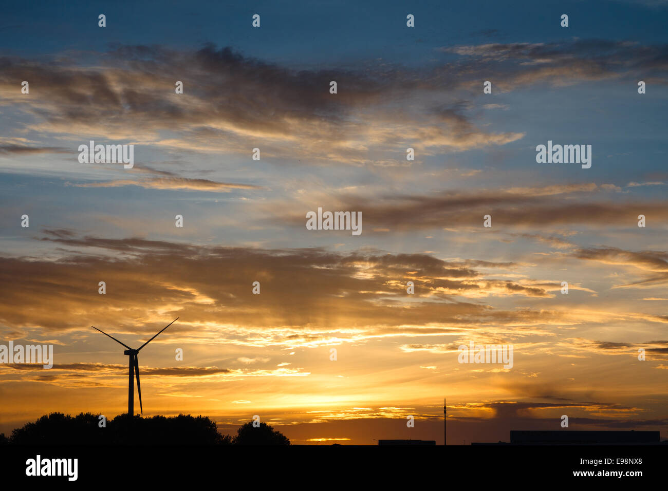 Windmill at sunset sky Stock Photo - Alamy