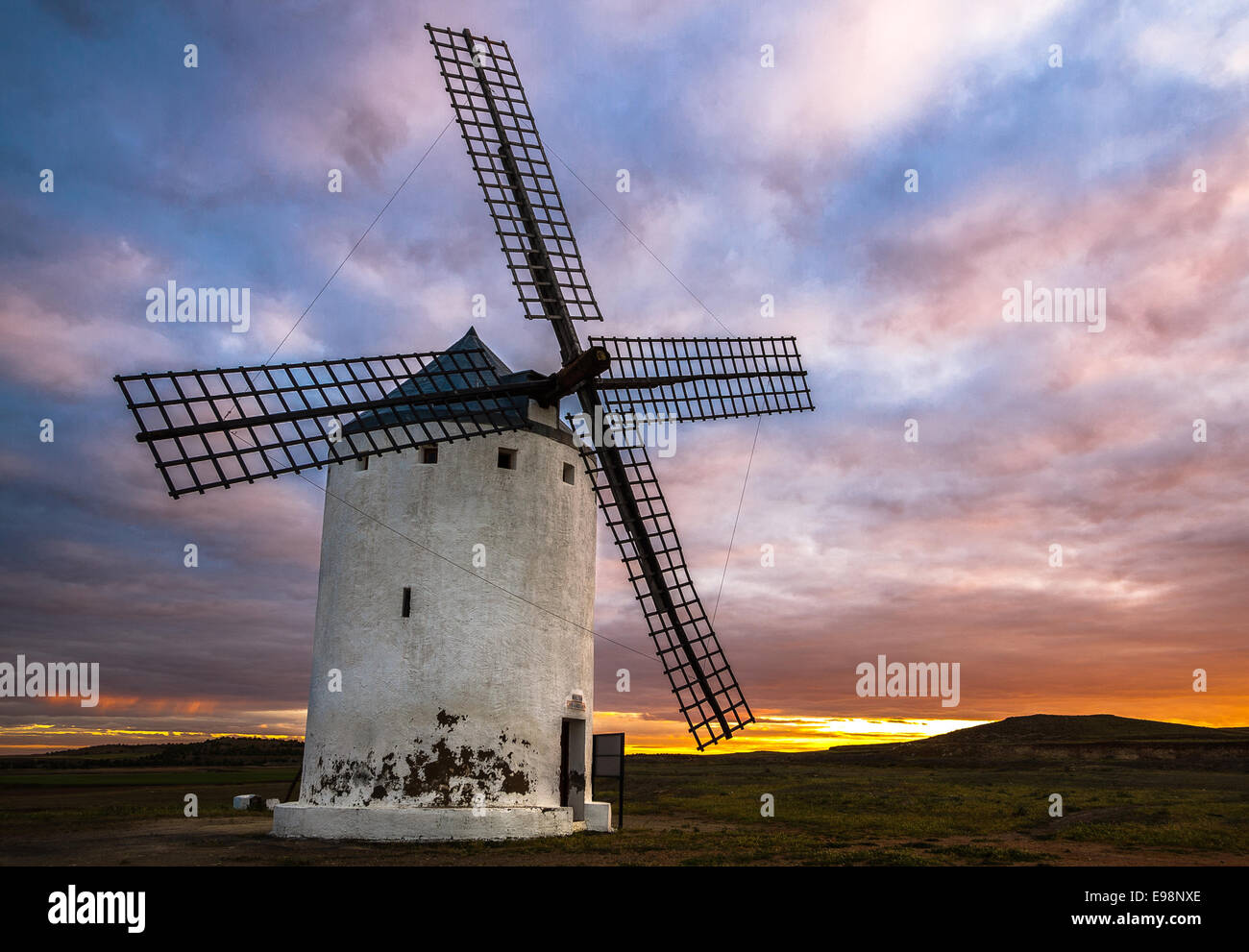The old windmill at sunrise Stock Photo - Alamy