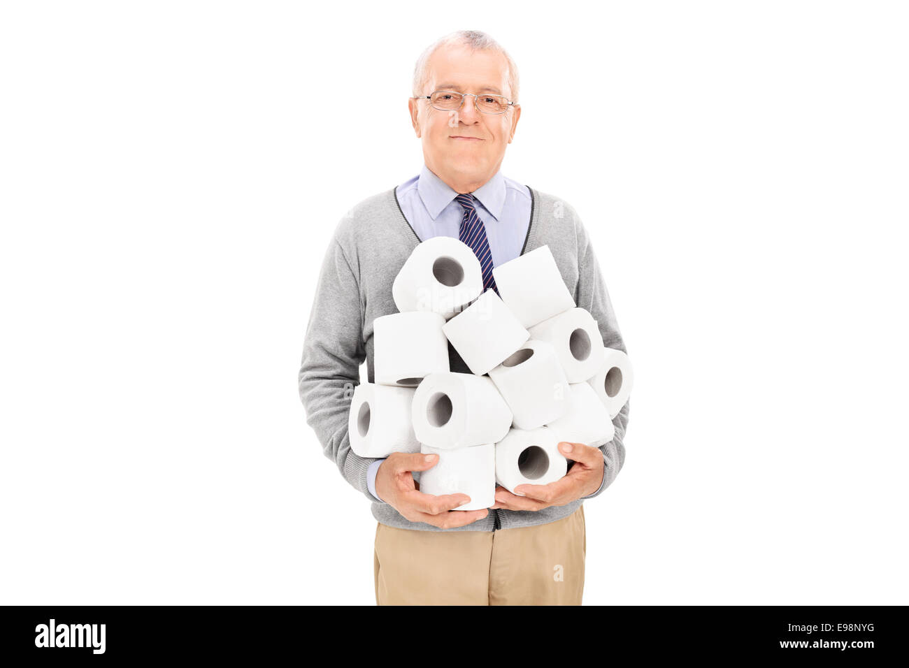 Senior carrying a pile of toilet paper isolated on white background ...
