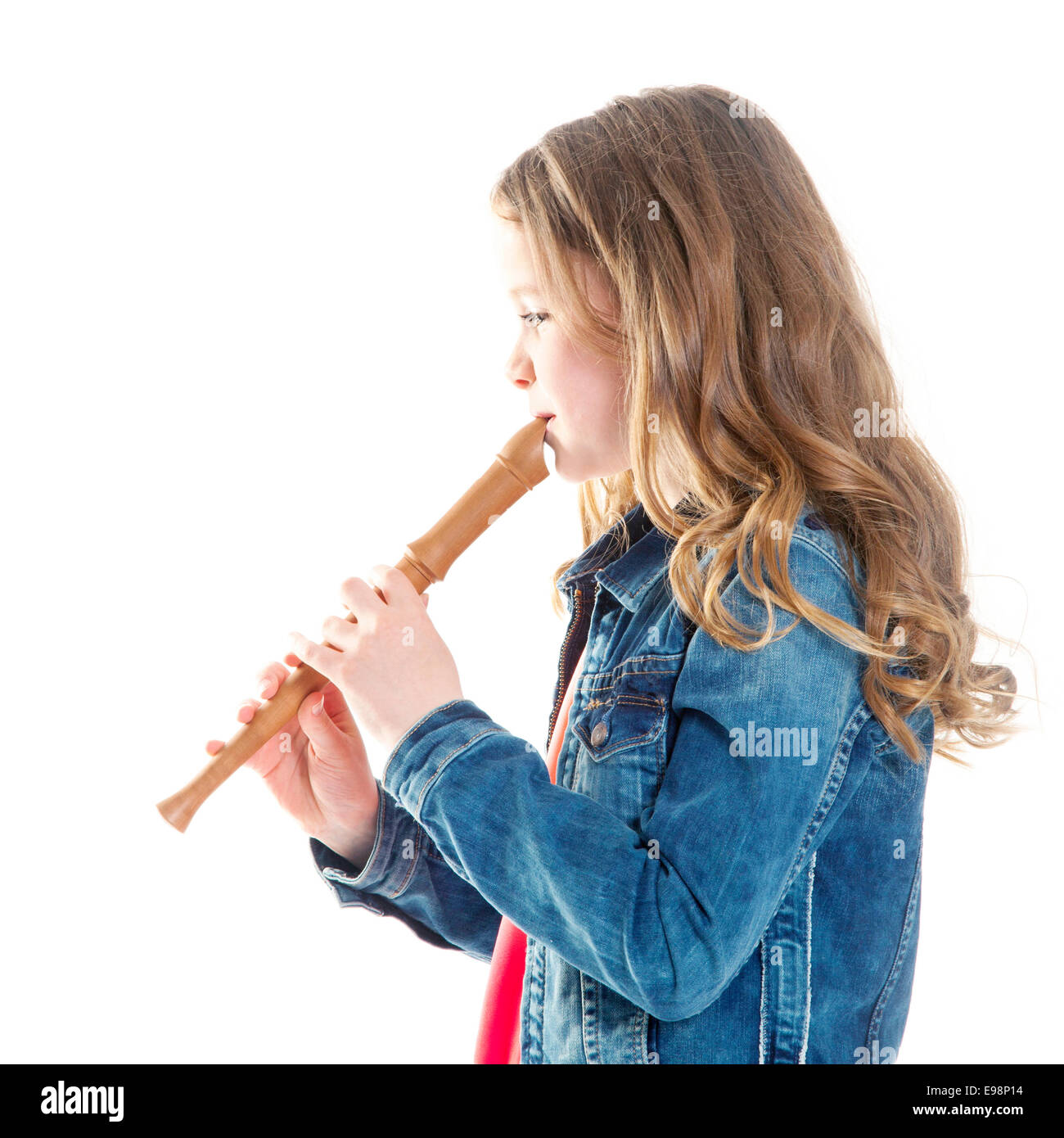 young girl with soprano recorder and white background Stock Photo - Alamy