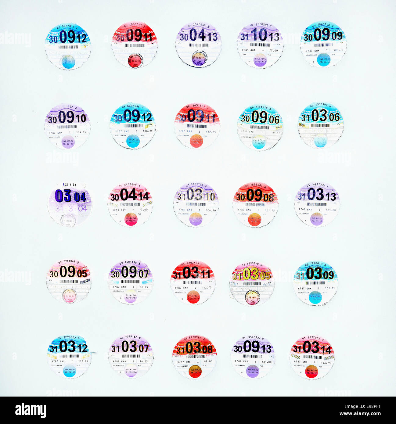 A collection of tax discs, displayed in a square pattern Stock Photo ...