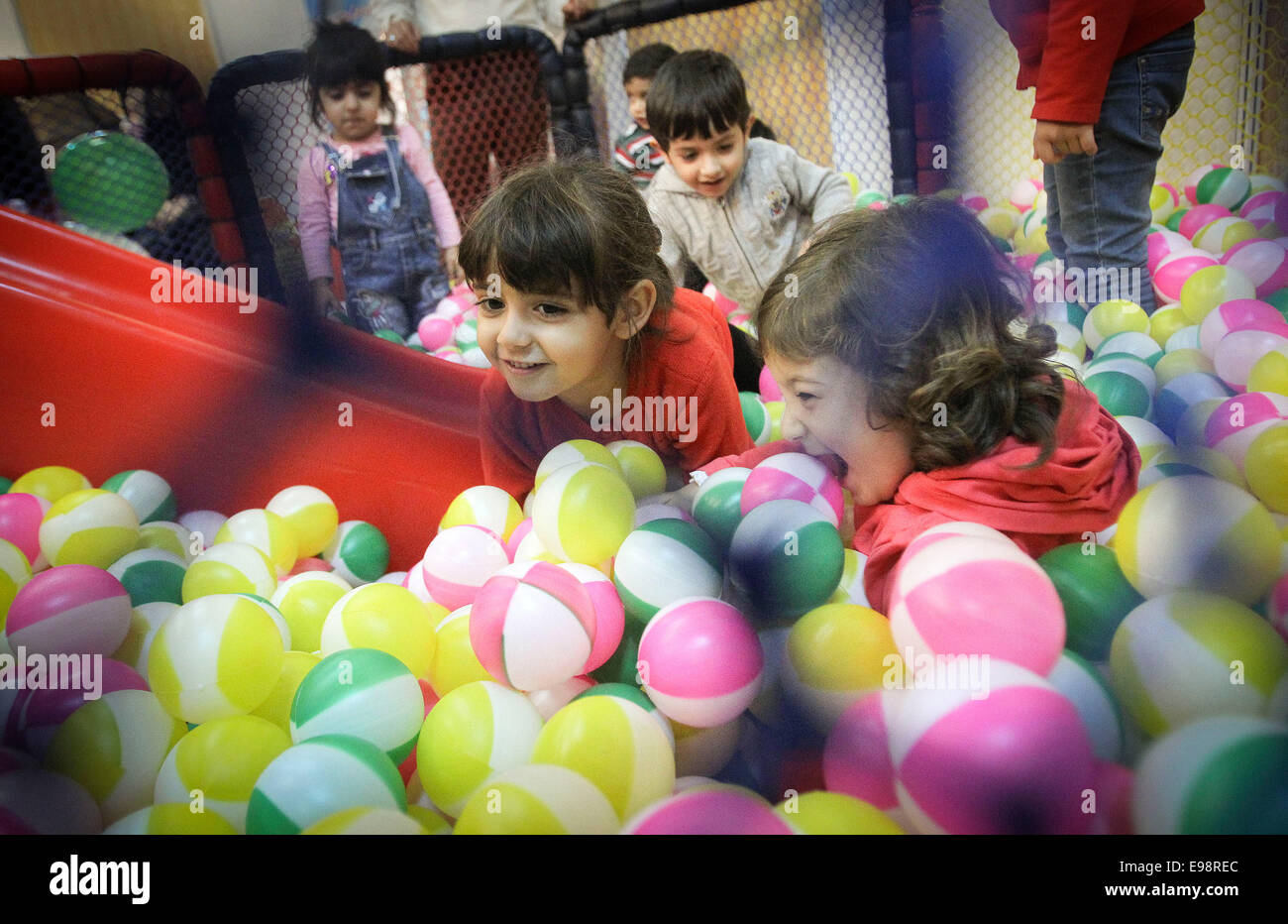 Tehran, Iran. 21st Oct, 2014. Iranian children play toys during a toy ...