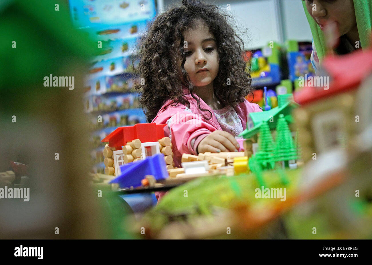 Tehran, Iran. 21st Oct, 2014. An Iranian girl plays toys during a toy ...