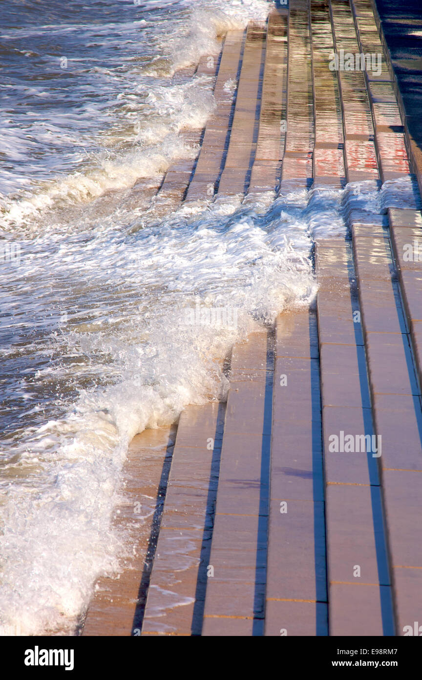 Sea coming over seafront steps at Blackpool Stock Photo - Alamy