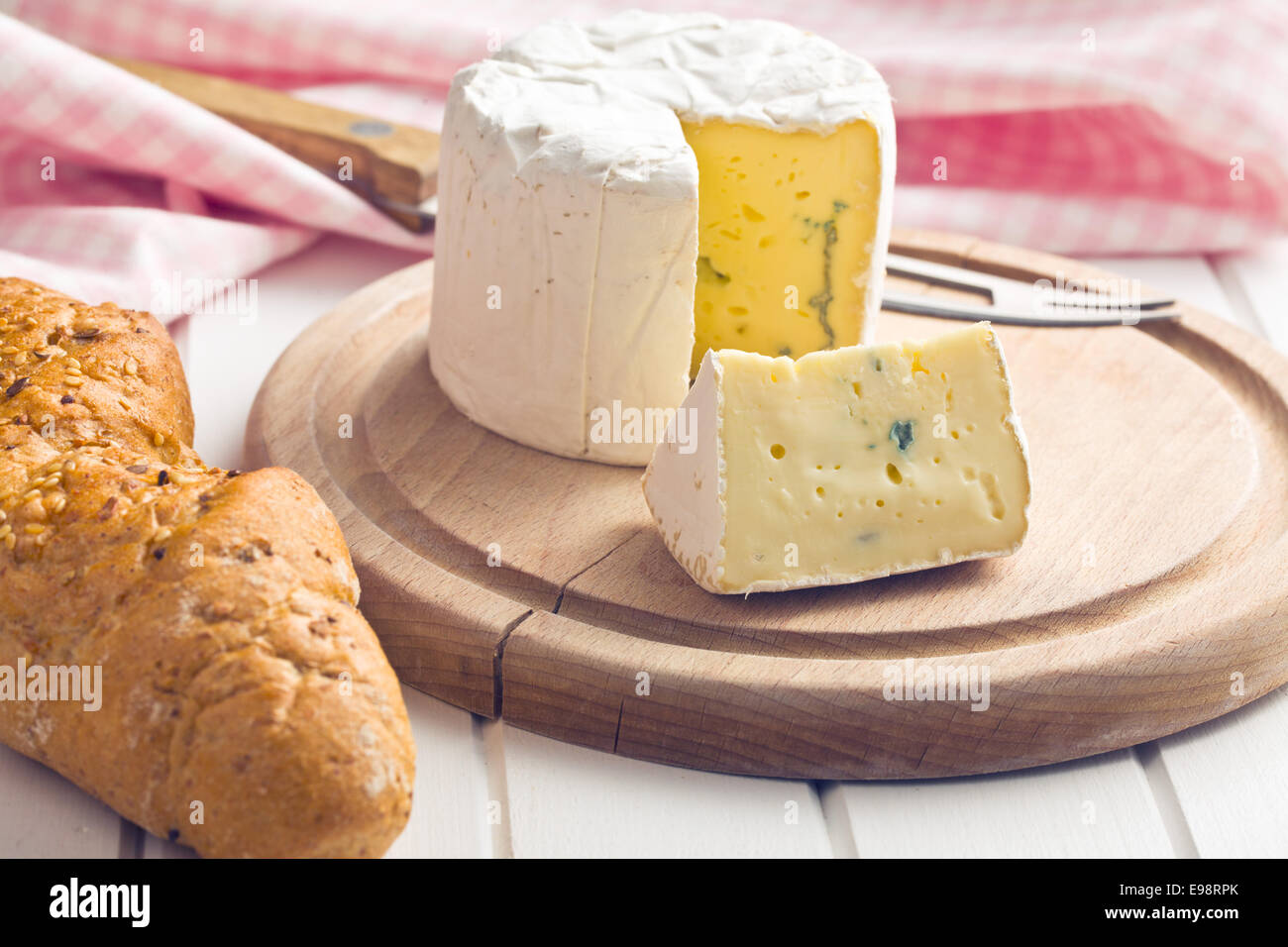 blue cheese on white kitchen table Stock Photo - Alamy