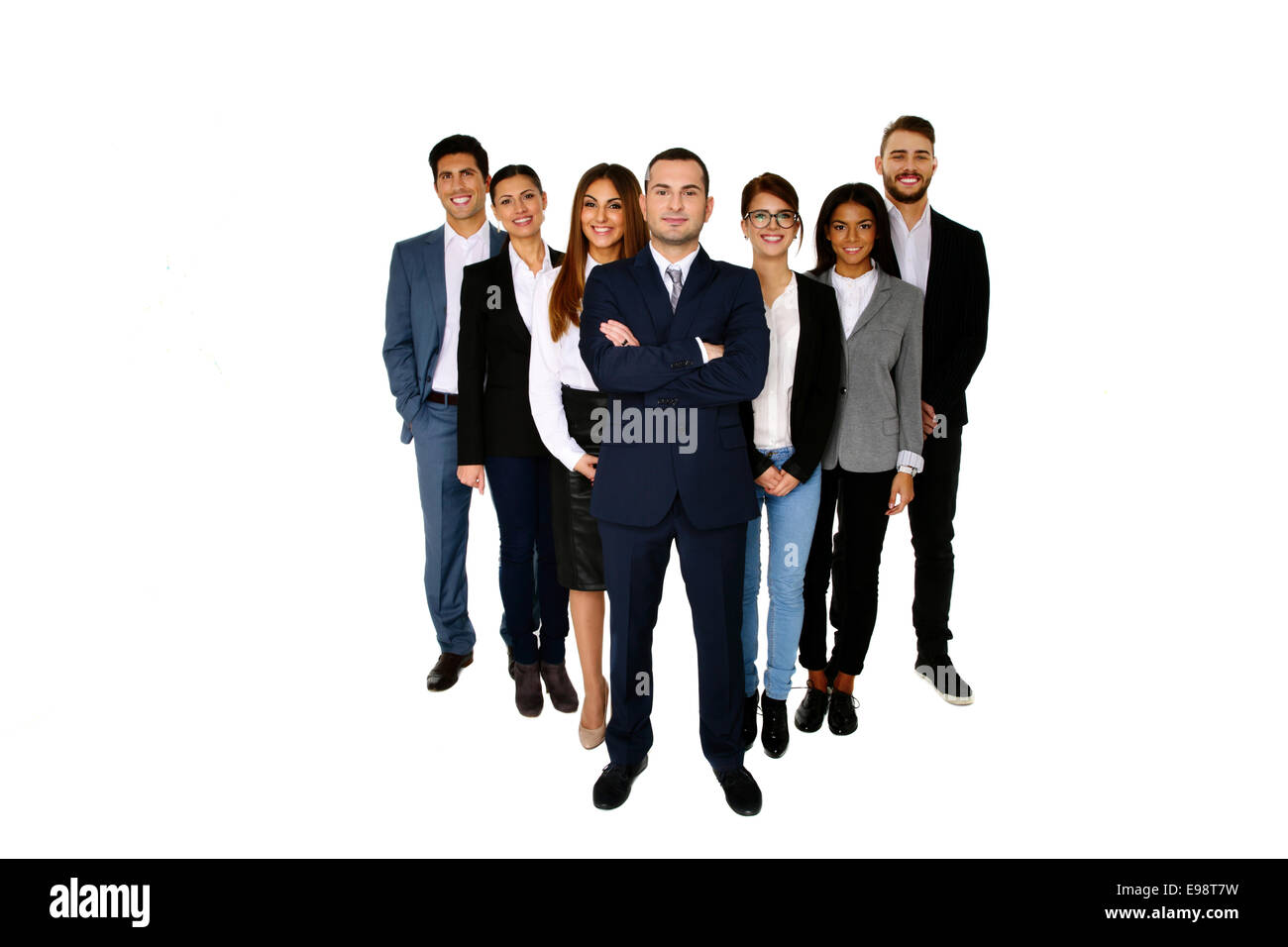 Smiling man leading his happy team over white background Stock Photo ...