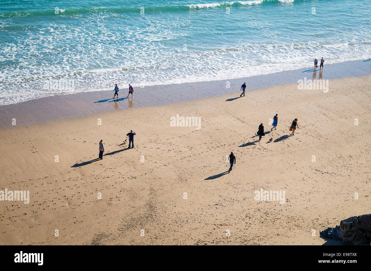 People on a sandy beach in Tenby UK Stock Photo - Alamy