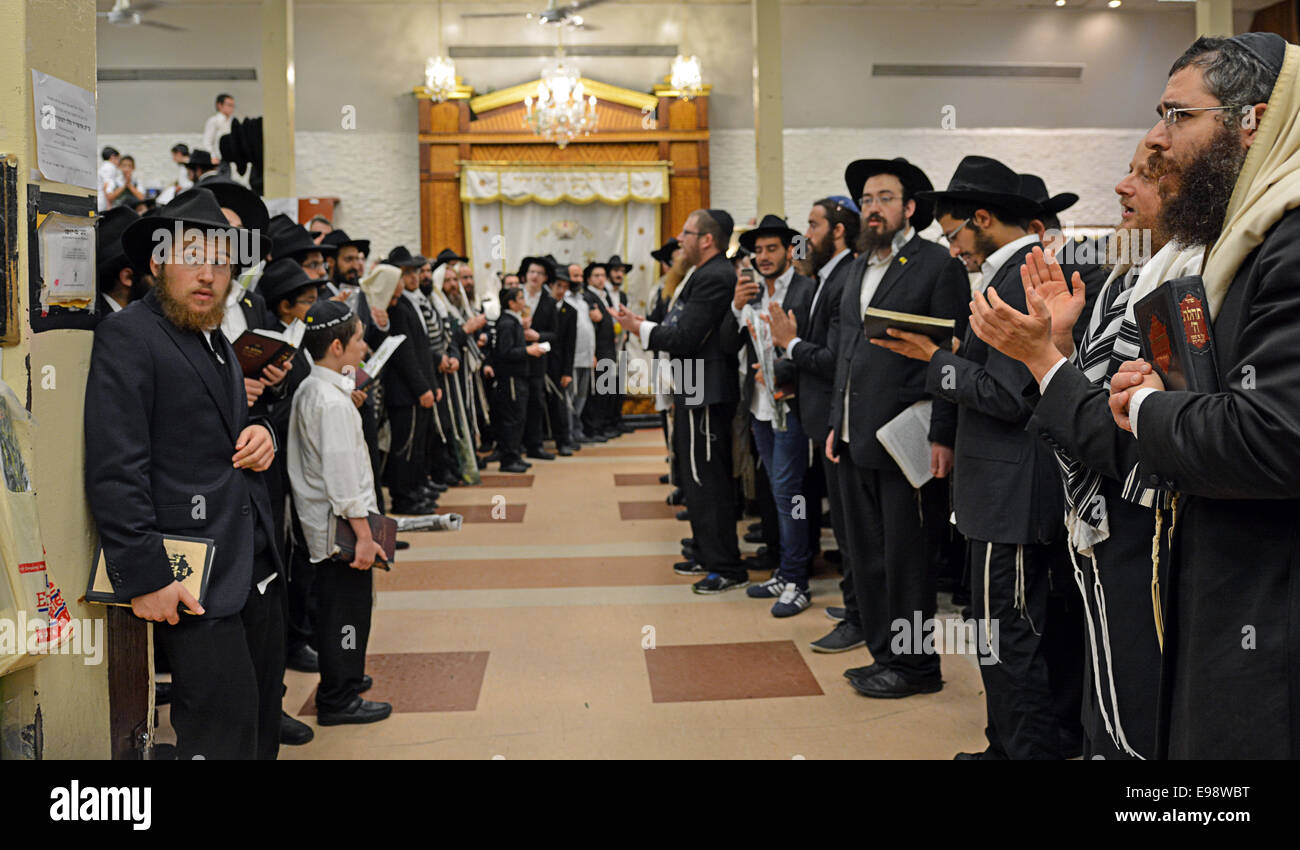 Crowd of ultra religious Jewish men prior to afternoon services at a ...