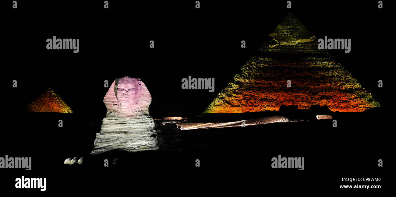 The Great Pyramid and The Great Sphinx of Giza, Egypt, lit up at night ...
