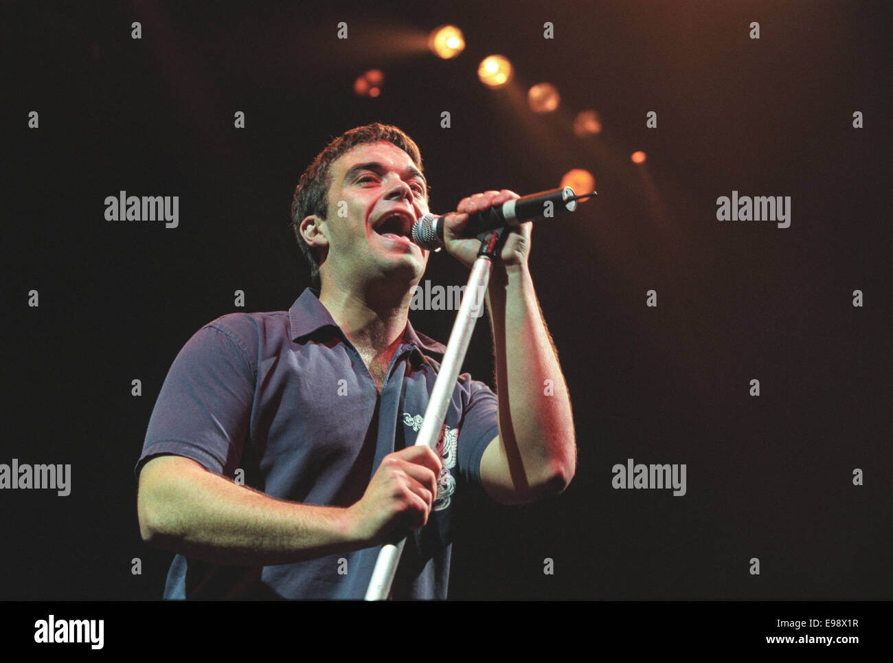 Robbie Williams in concert in Edinburgh, Scotland, in 1999 Stock Photo ...
