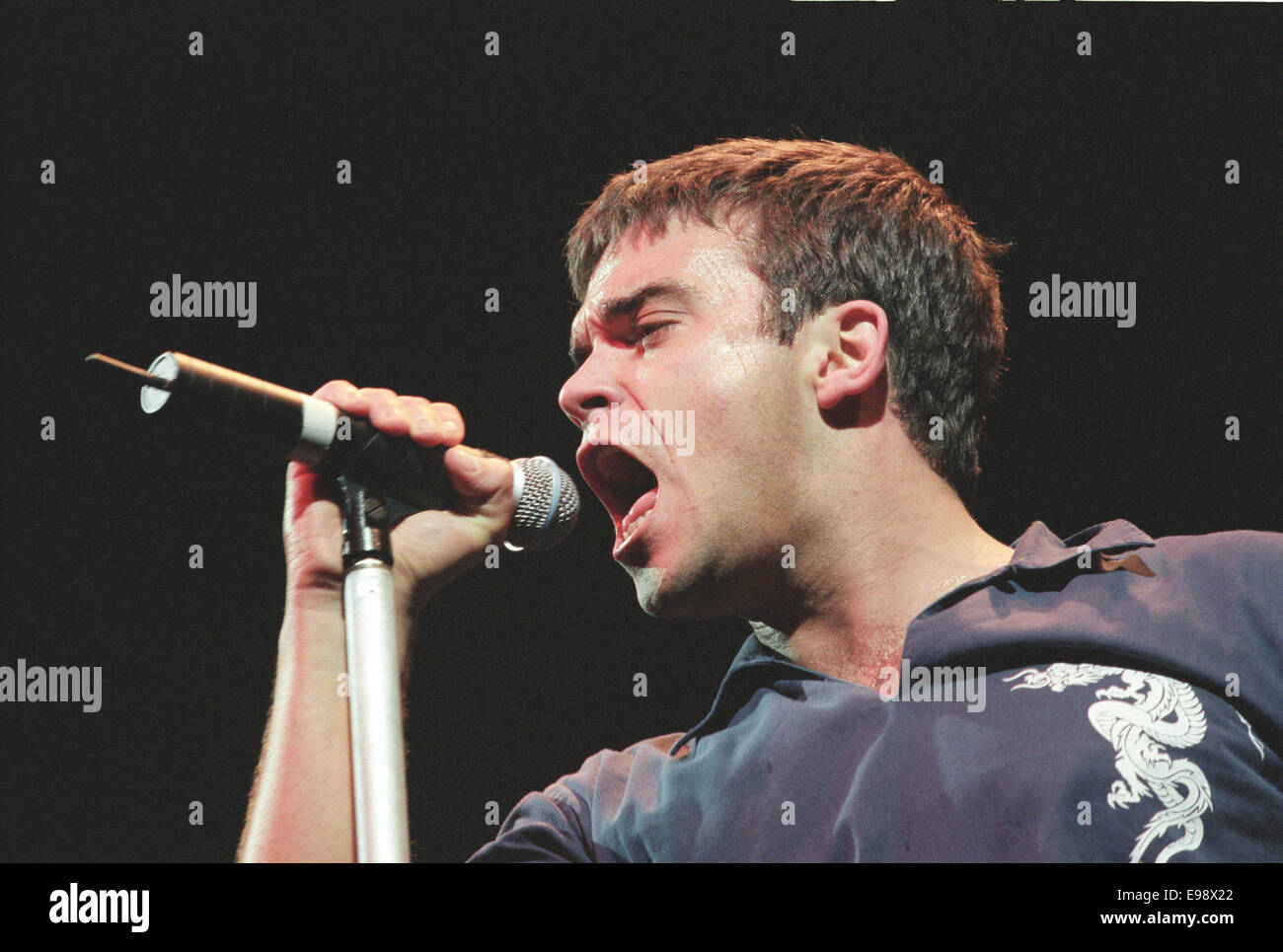 Robbie Williams in concert in Edinburgh, Scotland, in 1999 Stock Photo ...