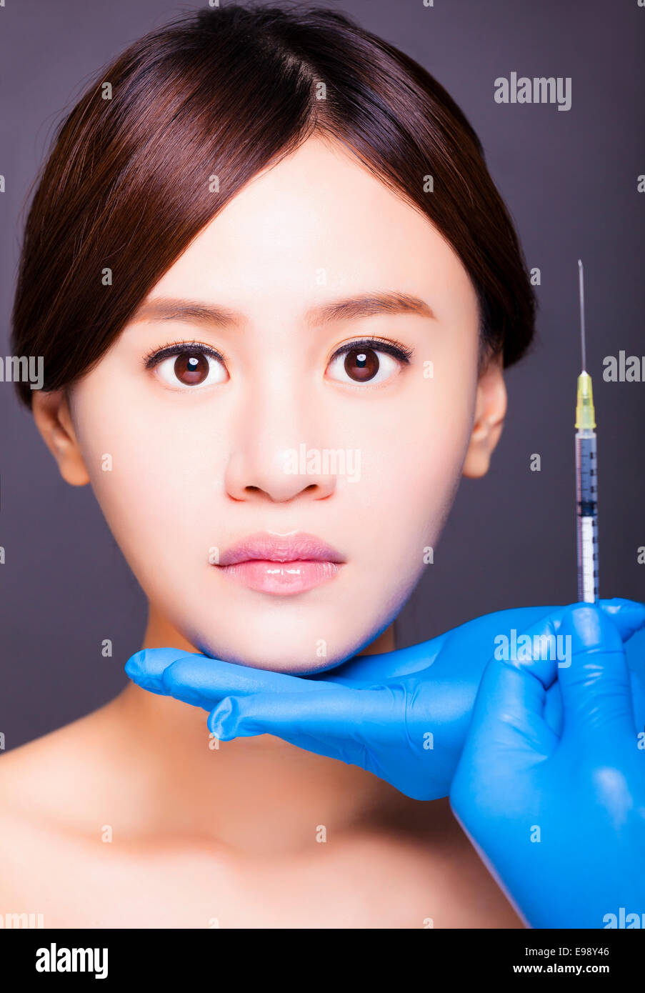 Face plastic surgery syringe hi-res stock photography and images - Alamy