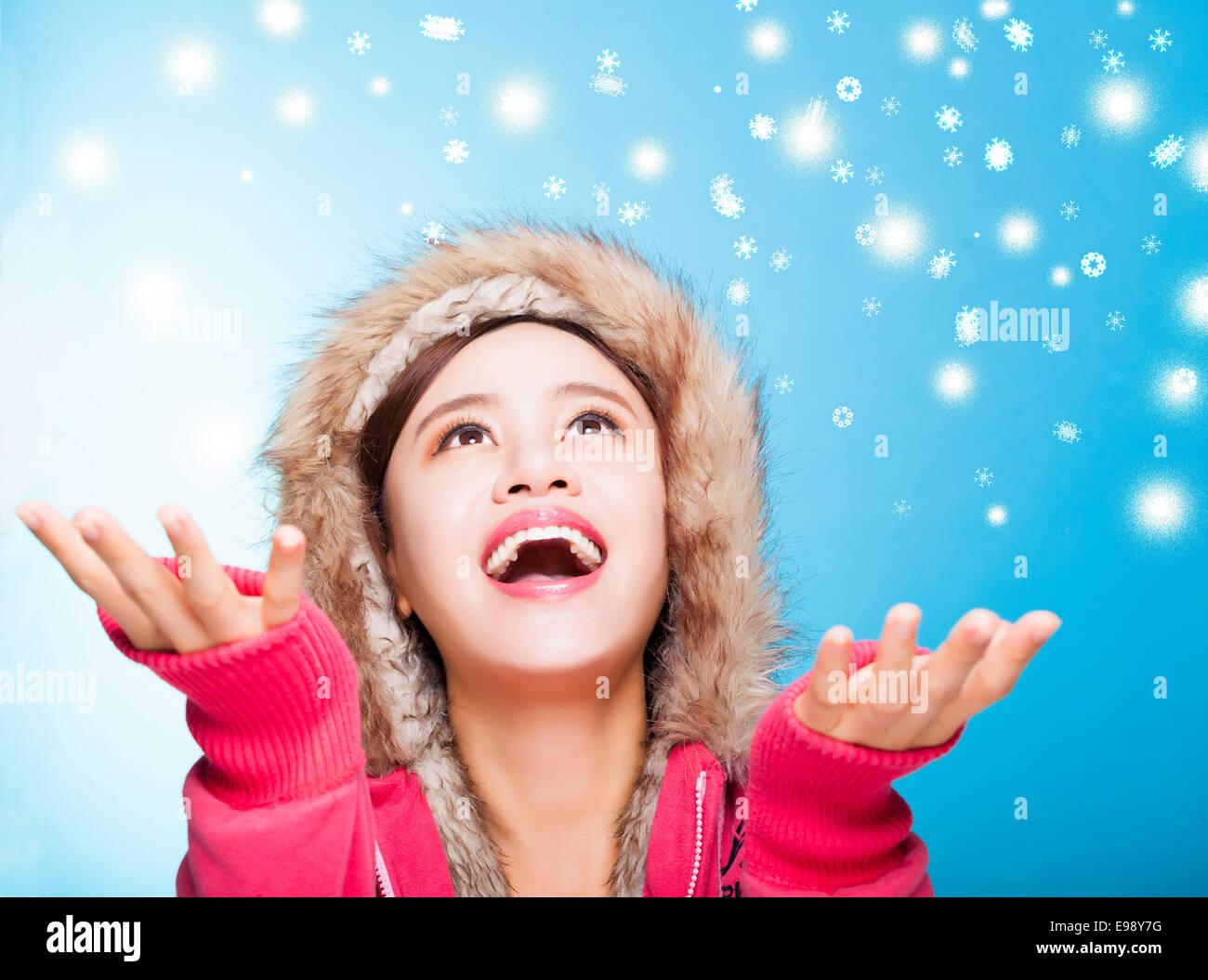 happy young woman watching winter snow Stock Photo - Alamy