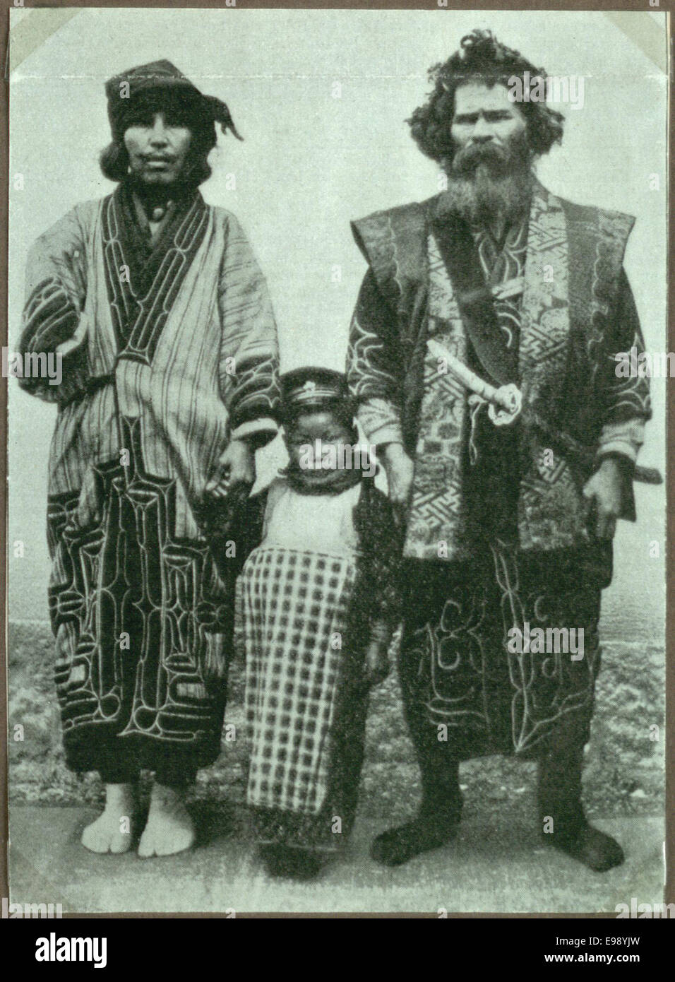 This image features a group of Aino people from Japan, showcasing the ...