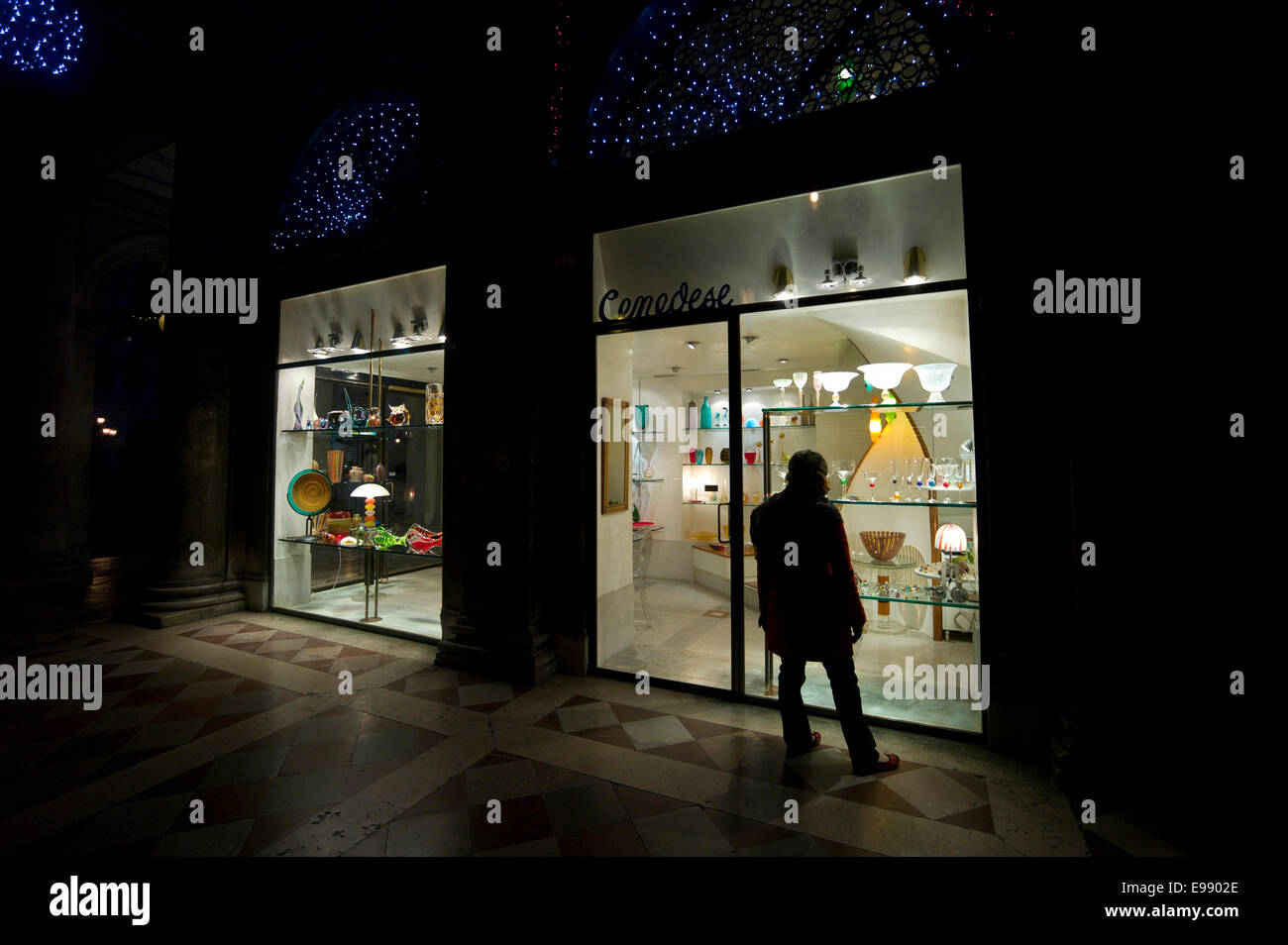 Window shopping at night in Venice, Italy Stock Photo - Alamy