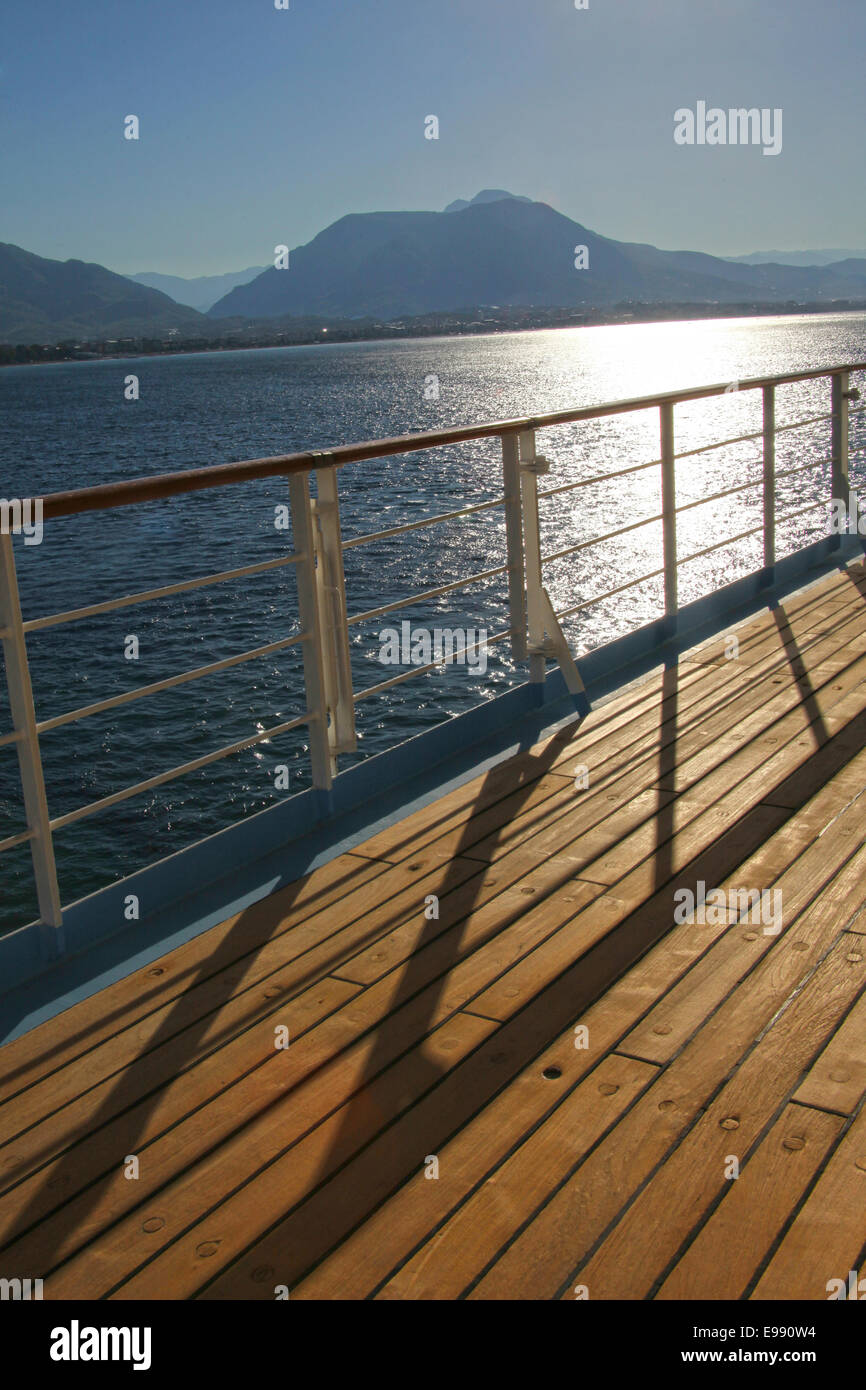View from the deck of a cruise ship. Wooden decks in the early morning ...