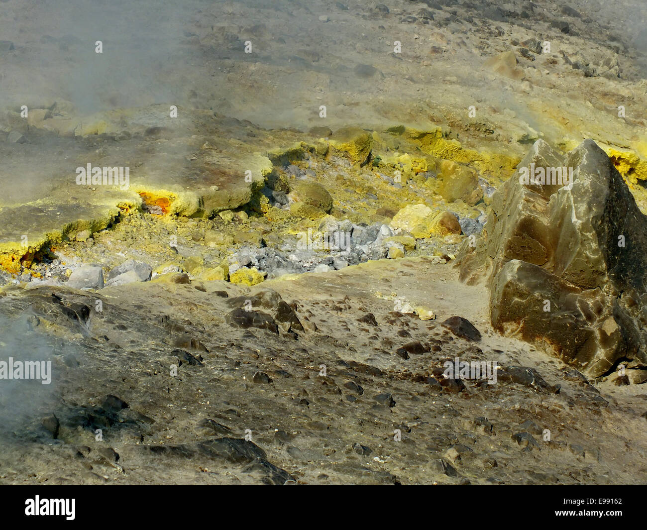 Crater rim and slopes are covered with stones and larger rocks. The ...