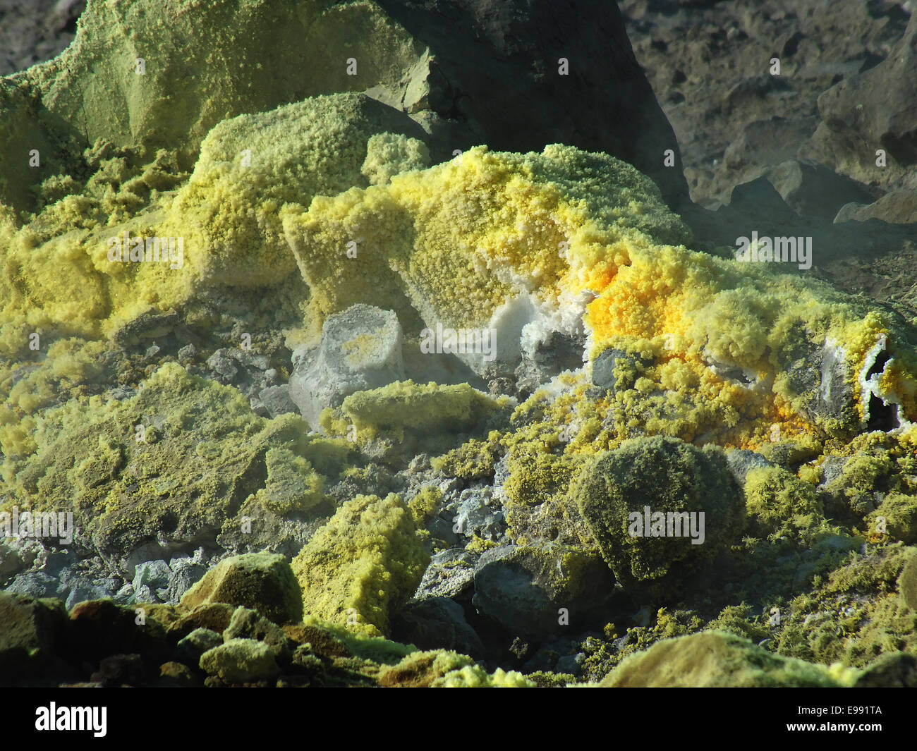 active volcano: Hot clouds and poisonous sulfur fumes rising high ...
