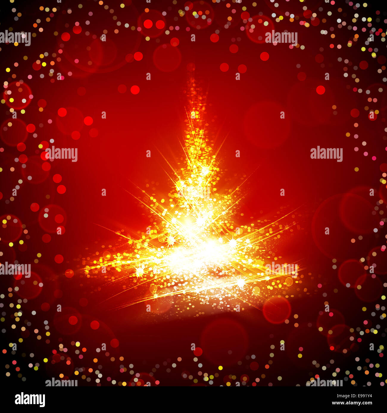 Sparkling golden tree against a red background Stock Photo - Alamy