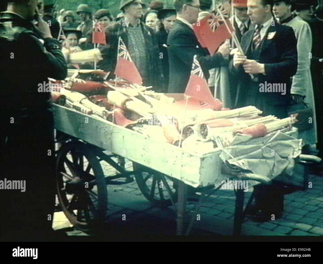 A photograph taken in Copenhagen in May 1945, showing a barrow (a cart ...