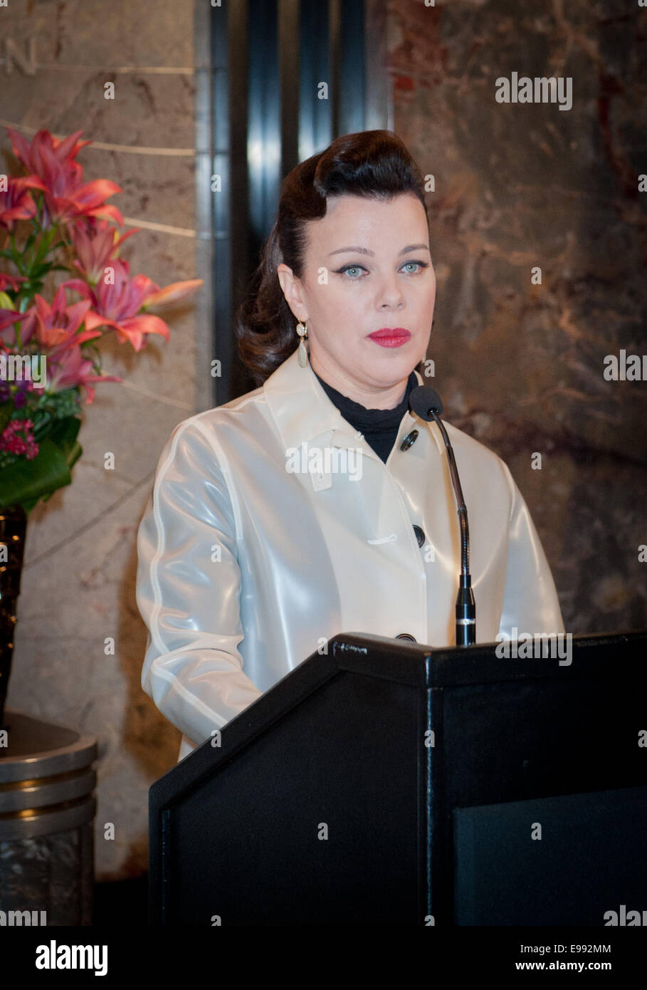 New York, USA. 22nd October, 2014. Actress DEBORAH MAZAR lights The ...