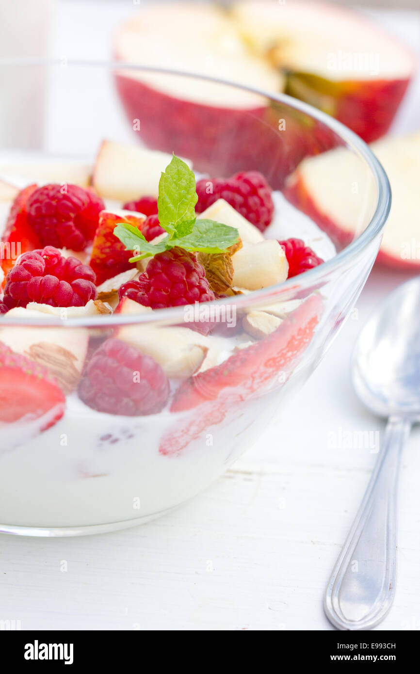 Raspberries, strawberries and apples with yogurt Stock Photo - Alamy