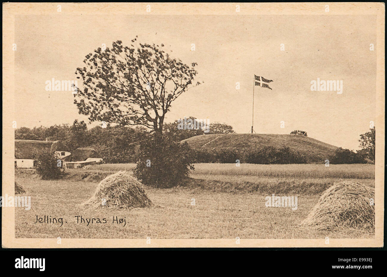 A photograph of the mound in Jelling, Denmark, a UNESCO World Heritage ...