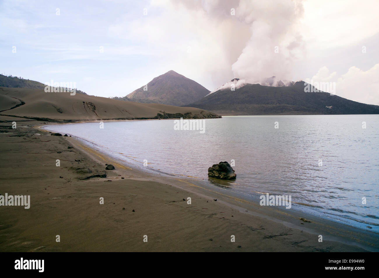 Mt. Tavurvur volcano emits a constant plume of smoke and ash, Rabaul ...
