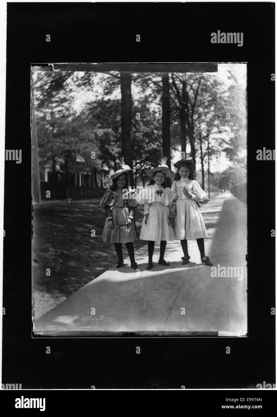 A photograph of two unidentified girls, capturing them in a moment of ...