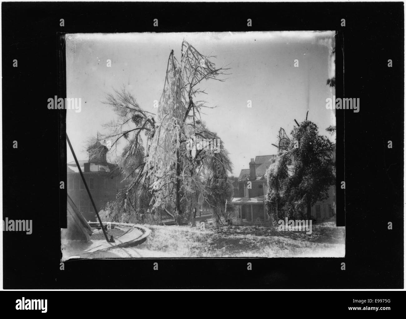 The photograph shows the Union Street School and the residence of J.E ...
