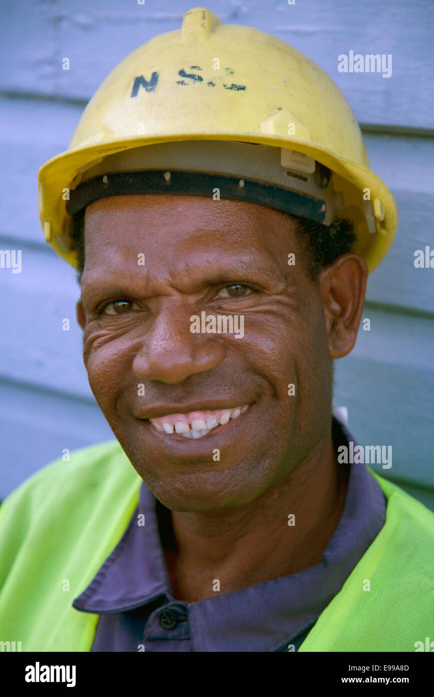 A dock hand at the Port of Rabaul, New Britain Island, Papua New Guinea ...