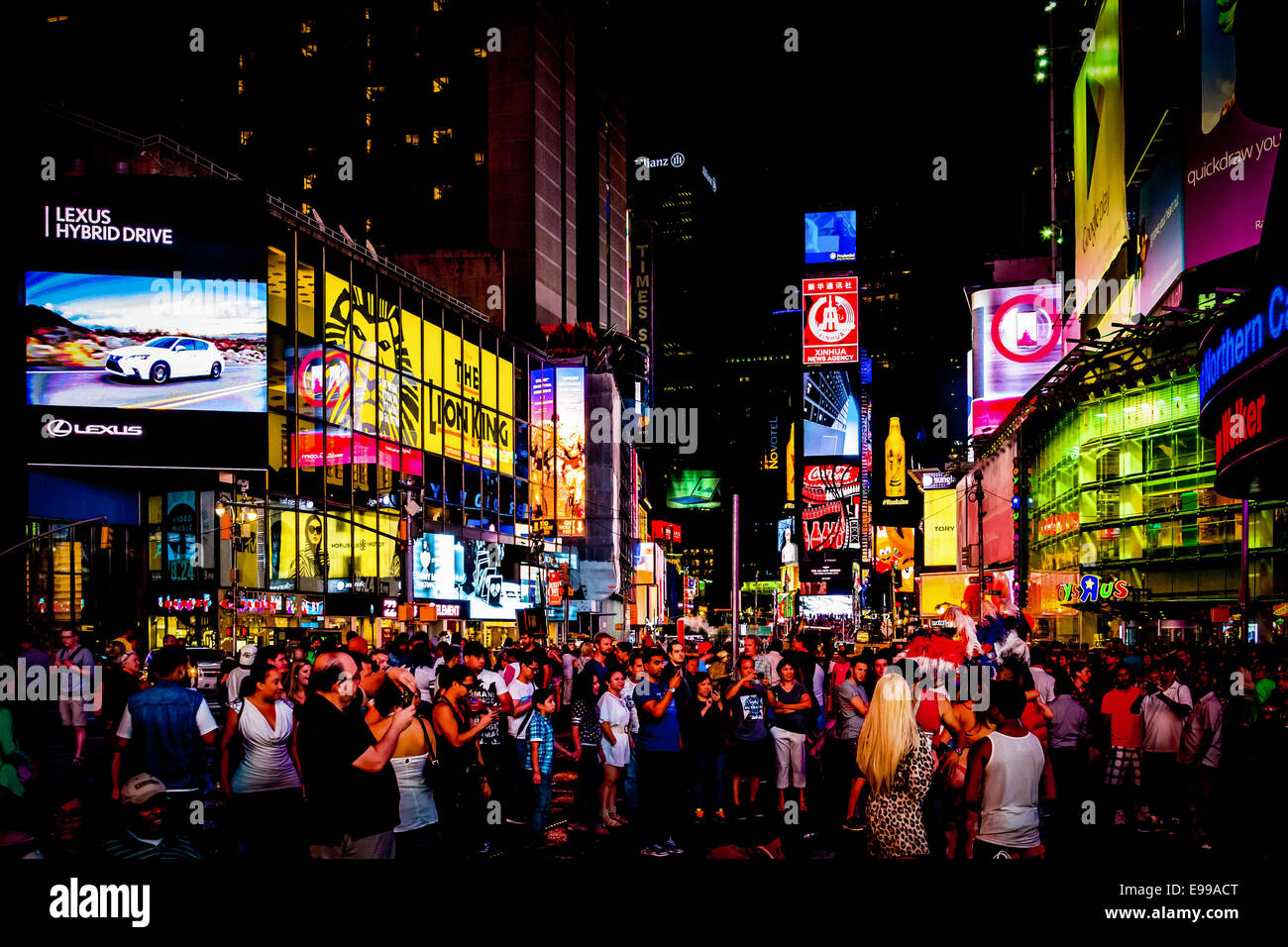 Large crowd of people in Times Square at night, in Midtown Manhattan ...