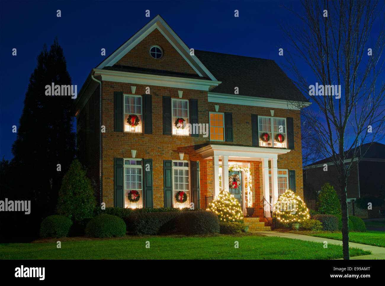 This traditional, Victorian-style brick home in a Christmas town ...