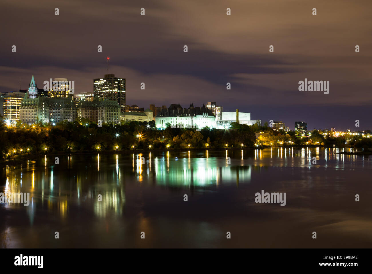 Part of the Ottawa Skyline at Night showing reflections in Ottawa River ...