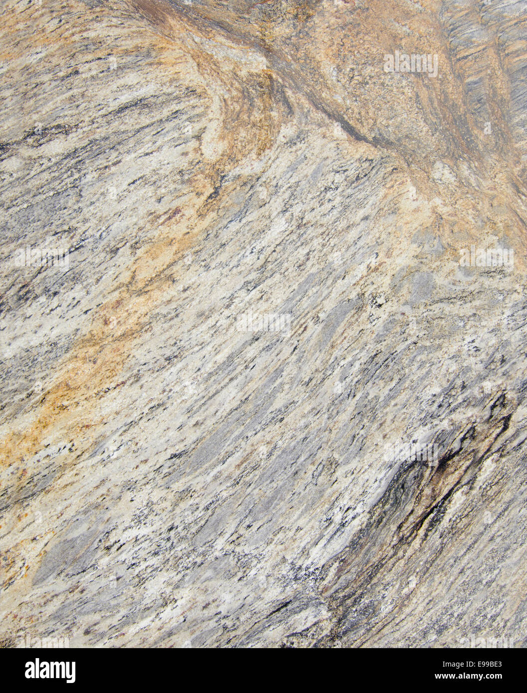 A full slab of cut and polished Granite makes a background of textures ...