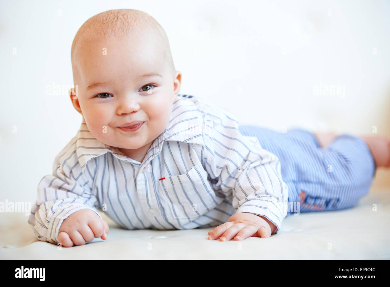 Cute baby boy with a lovely happy smile Stock Photo - Alamy