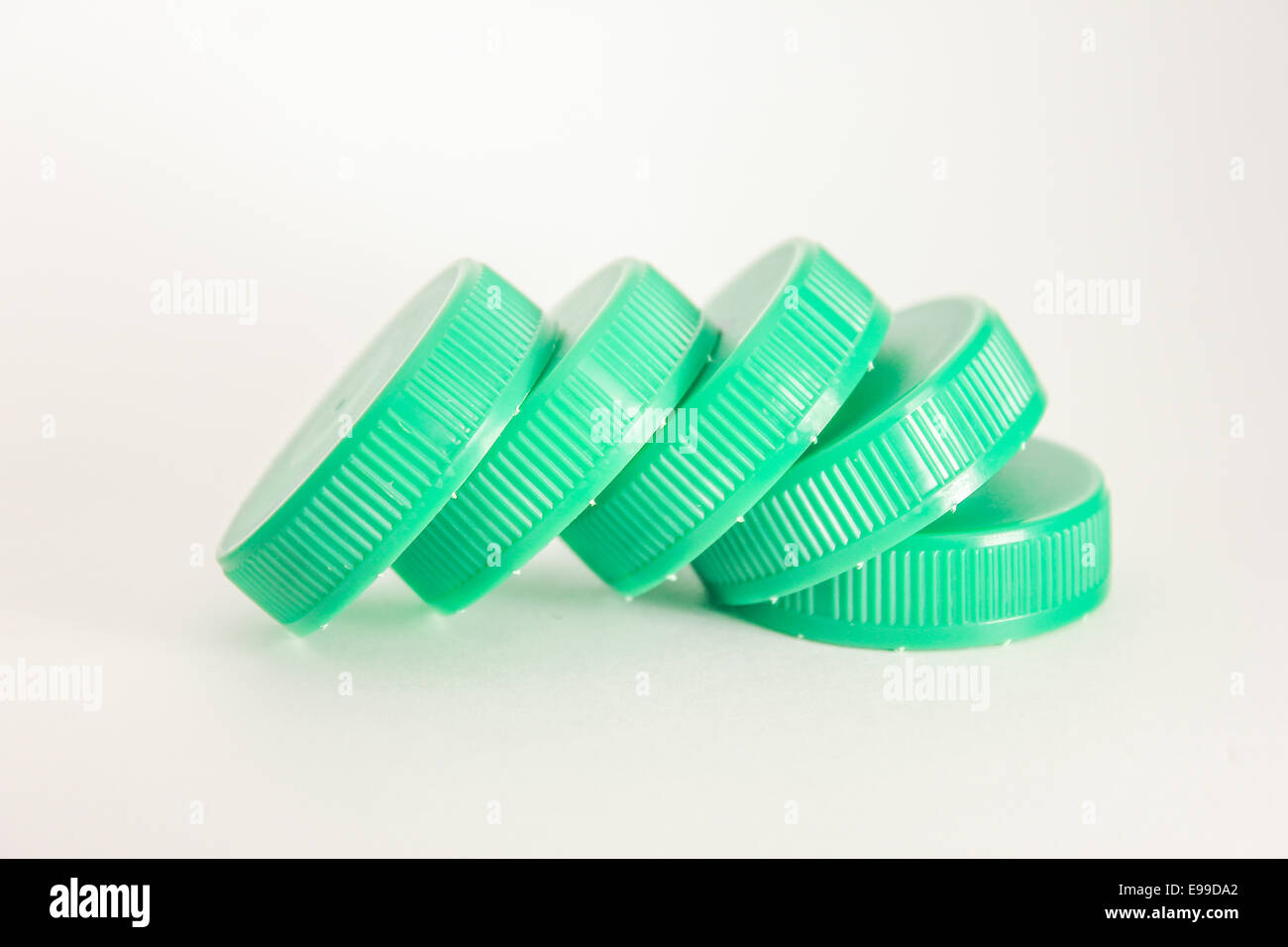 Stock Photo - Colorful plastic caps isolated in white Stock Photo - Alamy