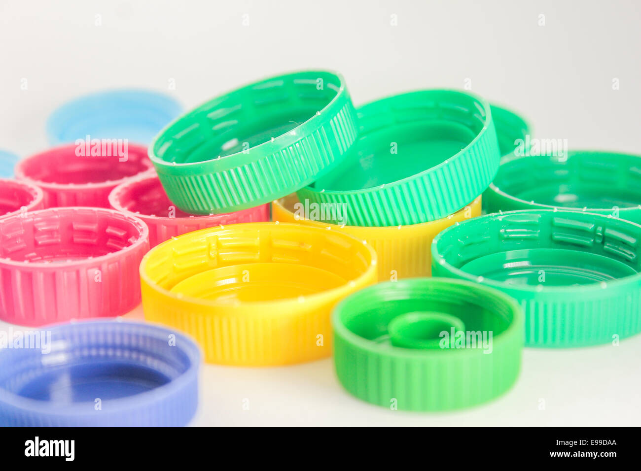 Stock Photo - Colorful plastic caps isolated in white Stock Photo - Alamy