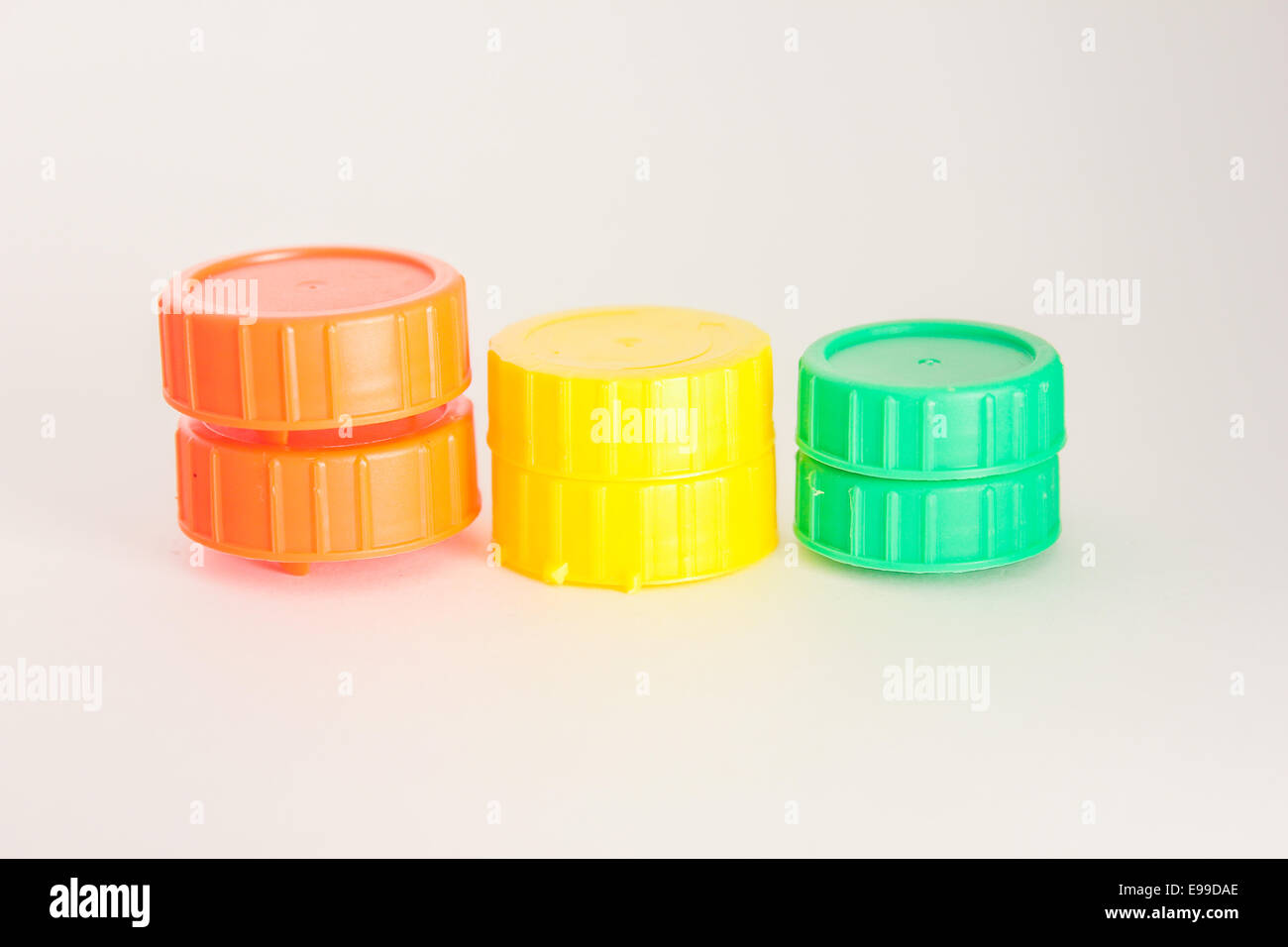 Stock Photo - Colorful plastic caps isolated in white Stock Photo - Alamy
