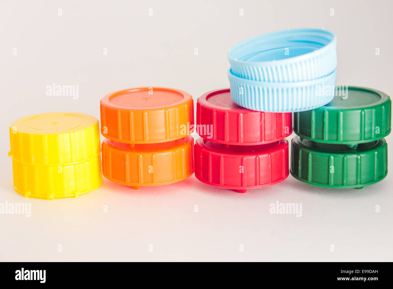 Stock Photo - Colorful plastic caps isolated in white Stock Photo - Alamy
